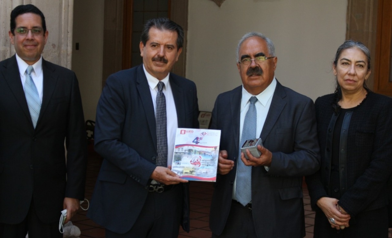 Rector recibe IV informe de labores de Director de FAMEN